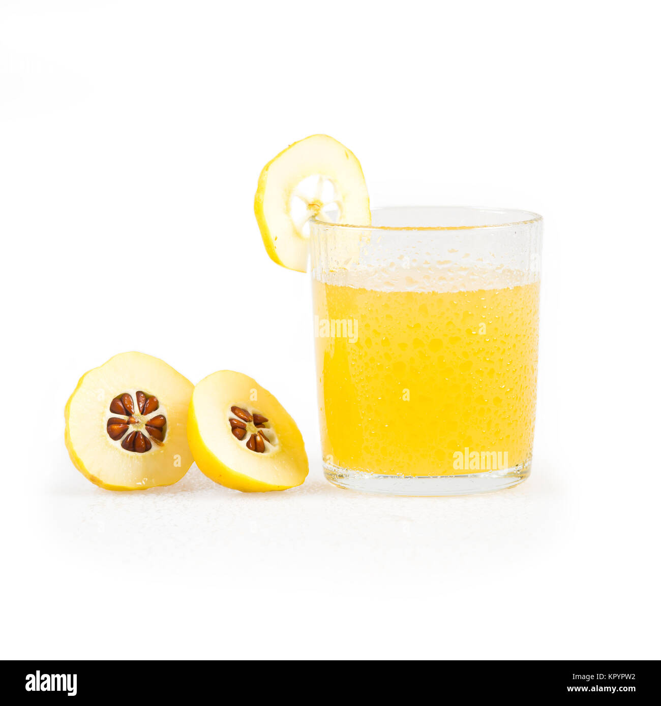 Chaenomeles japonica. Japanese Flowering Quince juice in glass and ...