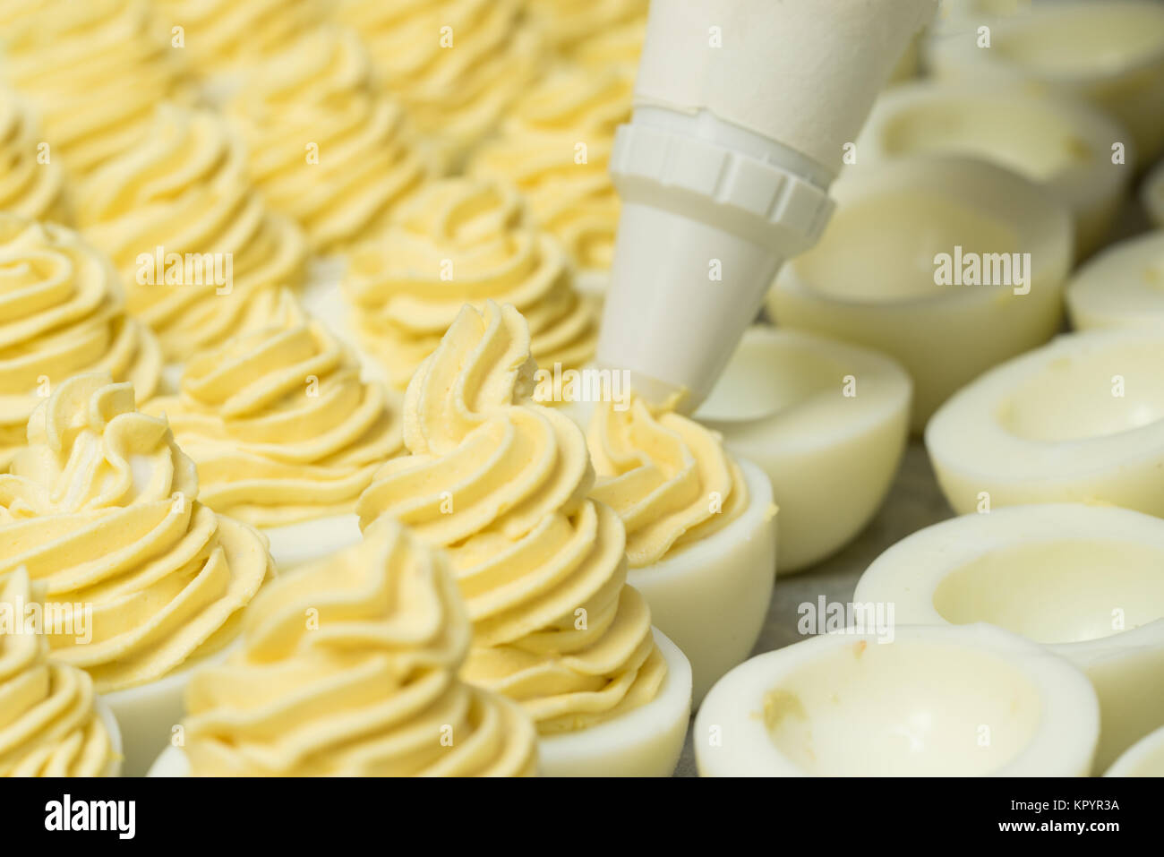 Sliced and filled boiled egg. Concept of food and organic farm products ...