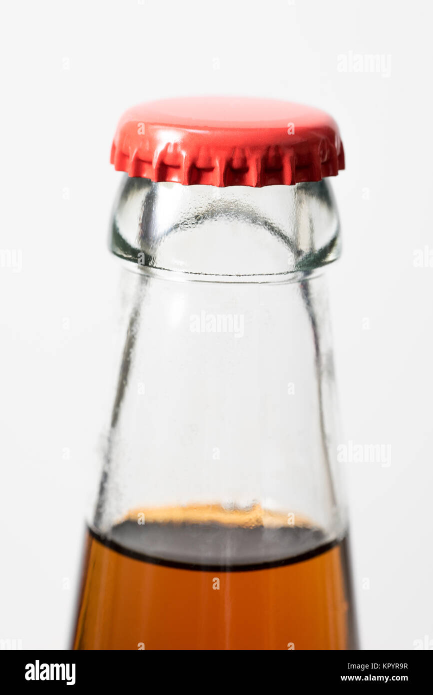 Glass bottle and red cap, white background Stock Photo - Alamy