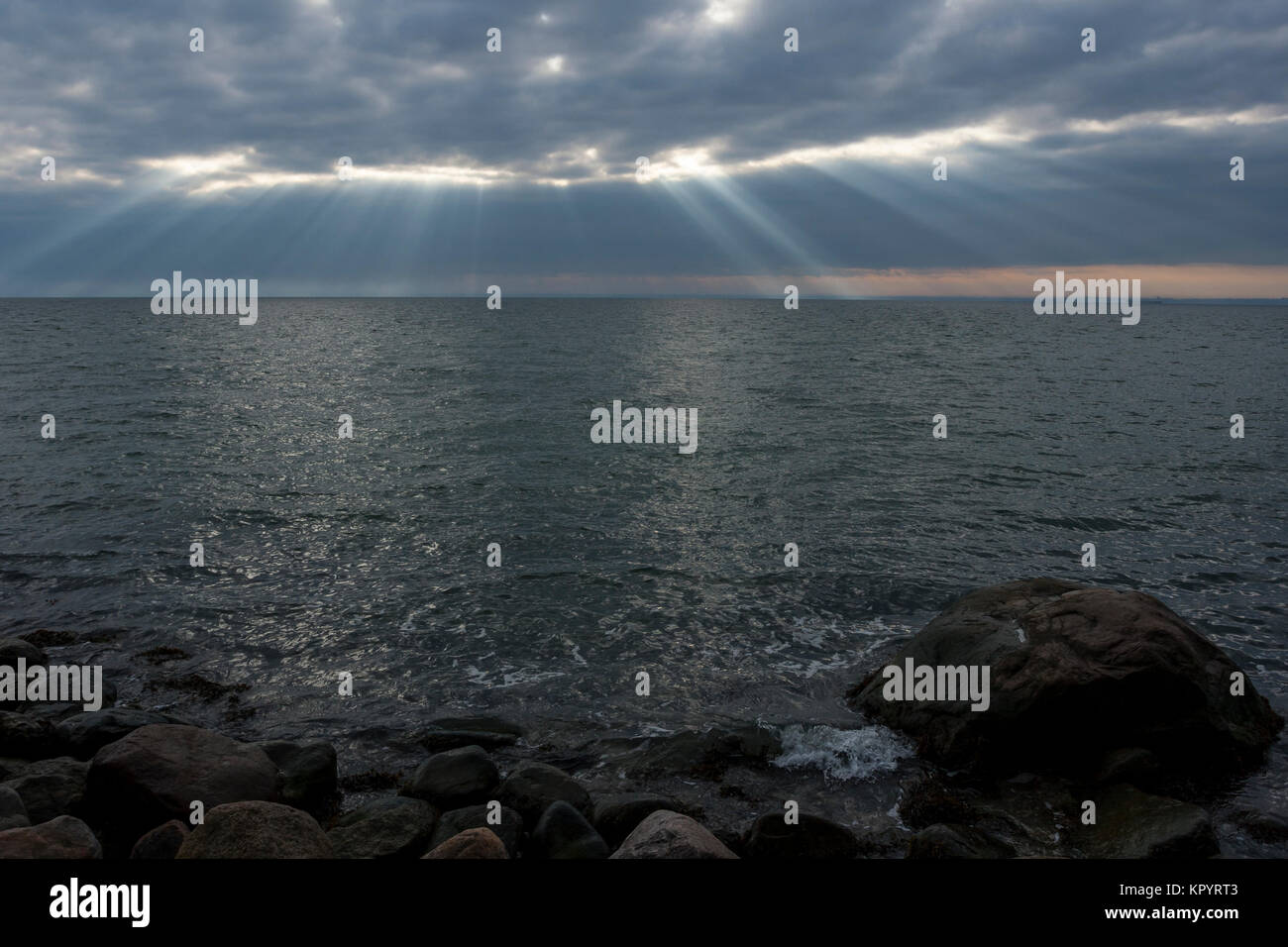 Crepuscular rays sun through clouds hi-res stock photography and images ...