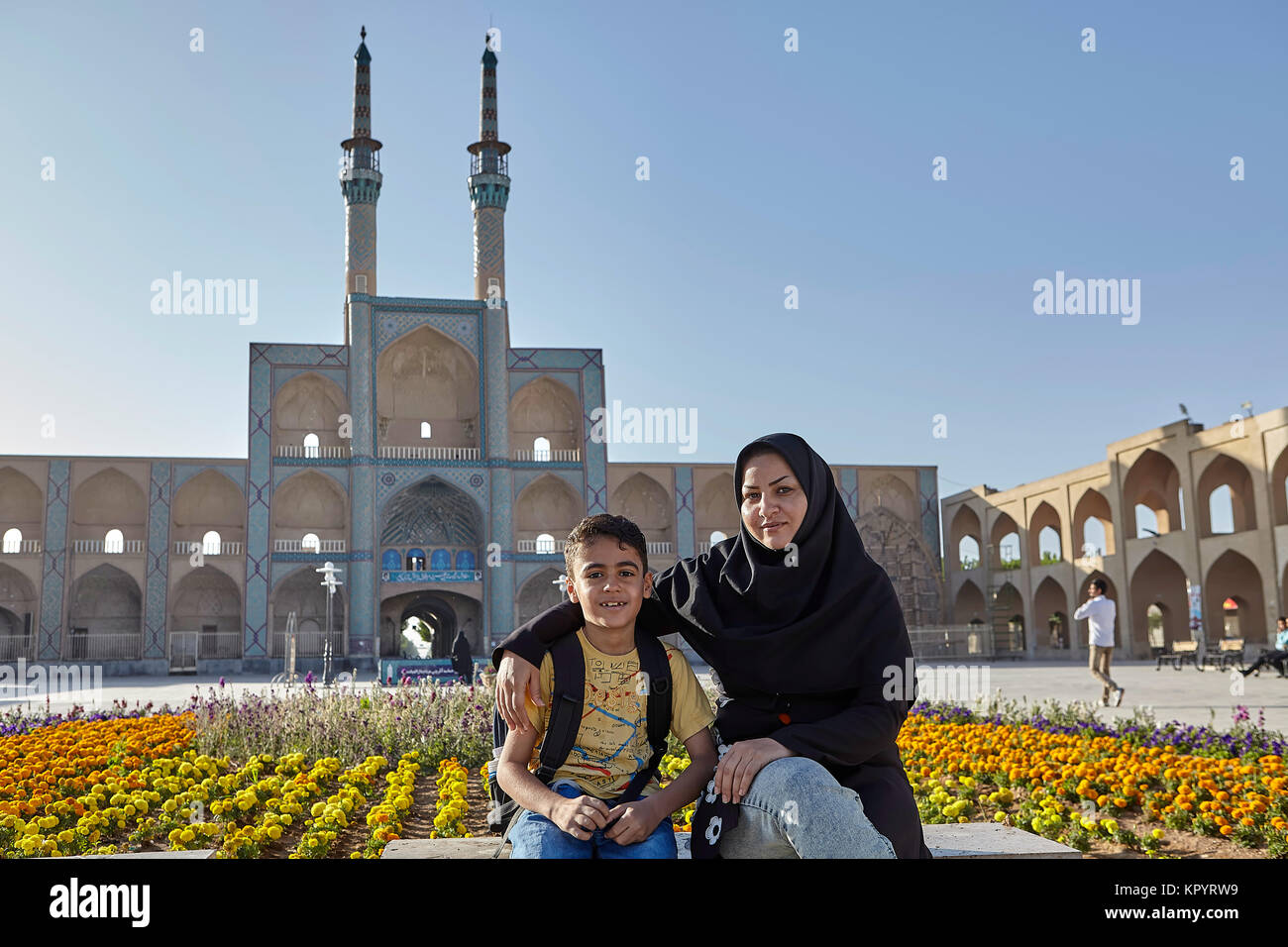 Yazd, Iran - April 21, 2017: Woman in the Islamic chador and her son ...