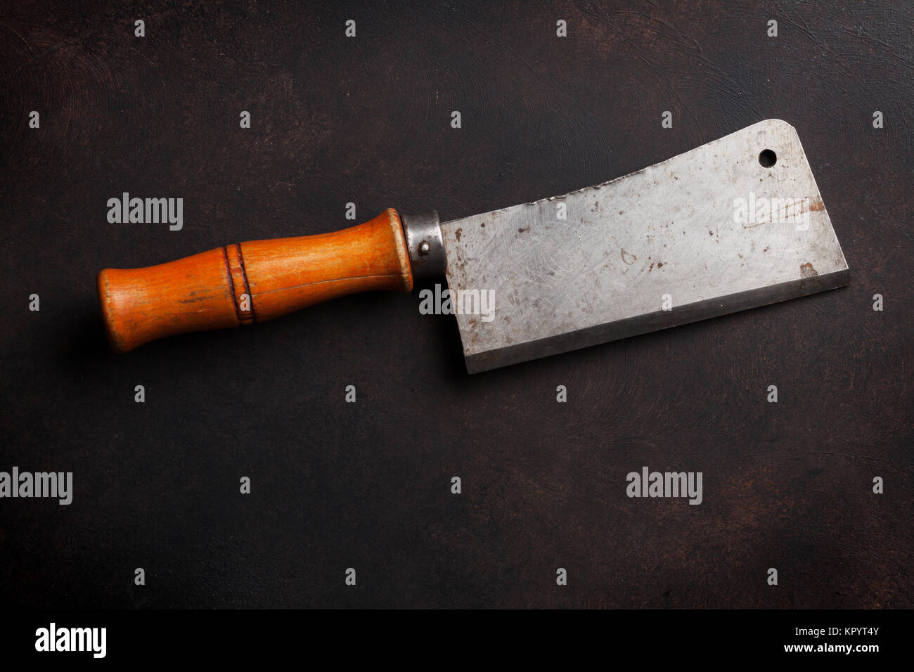 Butcher. Vintage meat knife over stone table. Top view Stock Photo - Alamy
