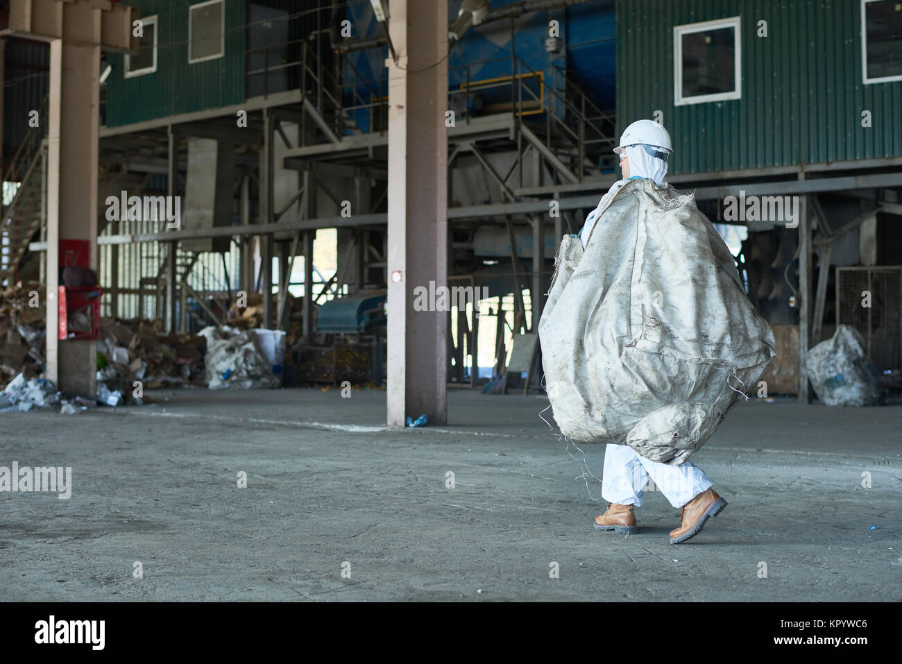 Worker in Warehouse of Recycling Factory Stock Photo - Alamy