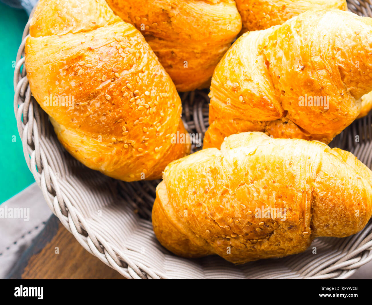 Savory croissants with sesame seeds in basket Stock Photo - Alamy
