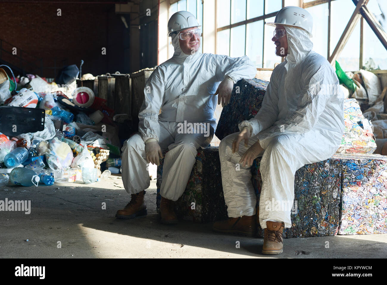 Workers in Waste Processing Workshop Stock Photo - Alamy