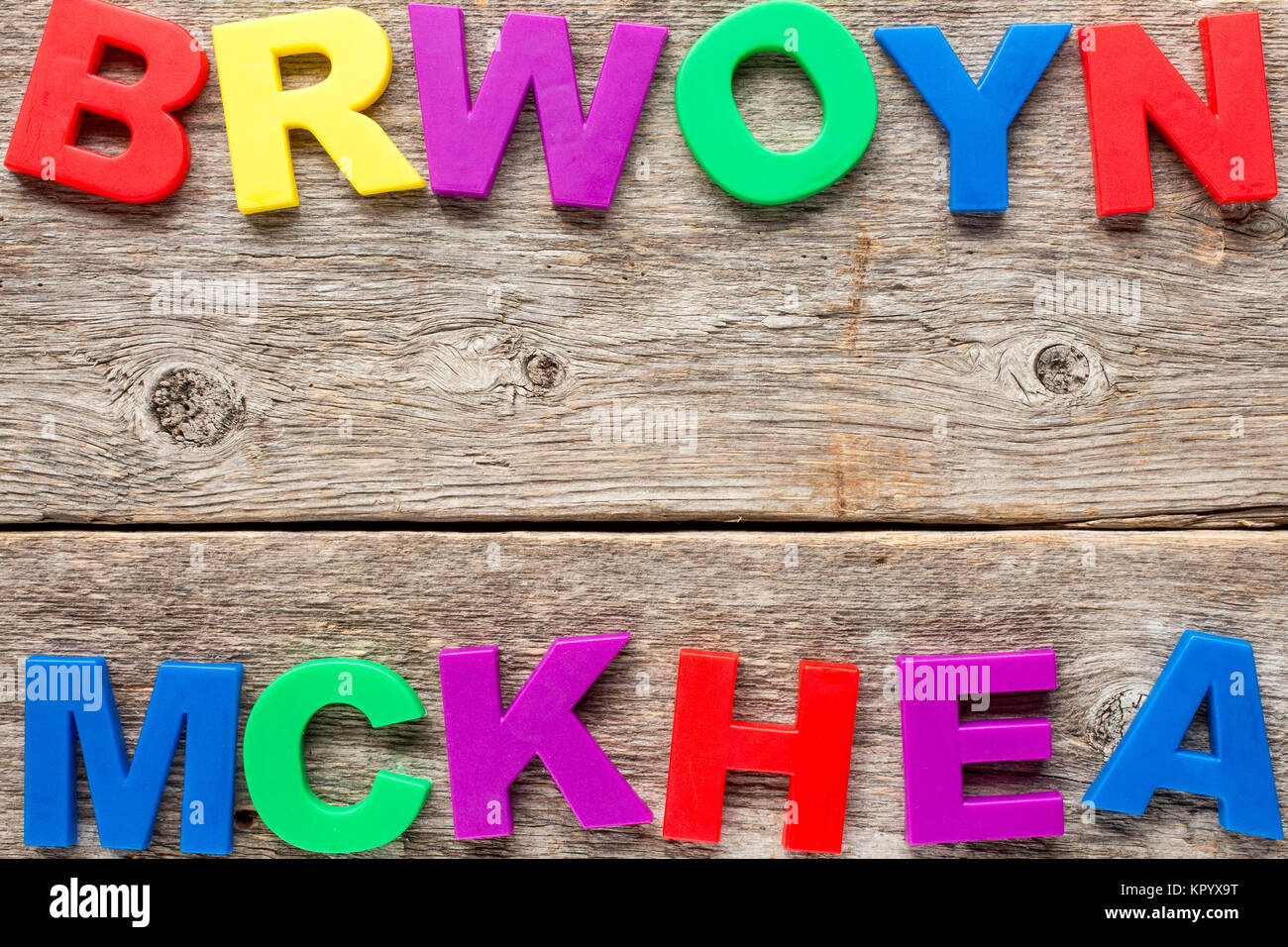 Wooden background with color letters Stock Photo - Alamy