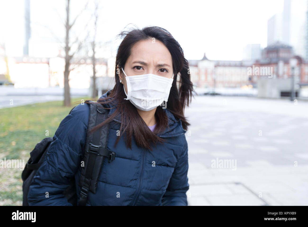 Woman wearing face mask at outdoor Stock Photo - Alamy