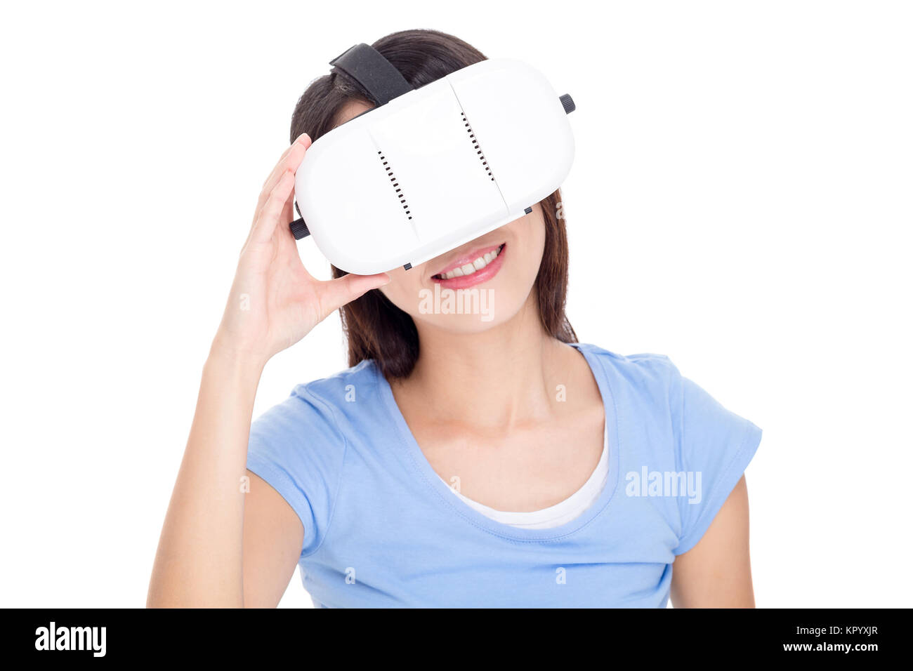 Woman looking virtual reality device Stock Photo - Alamy