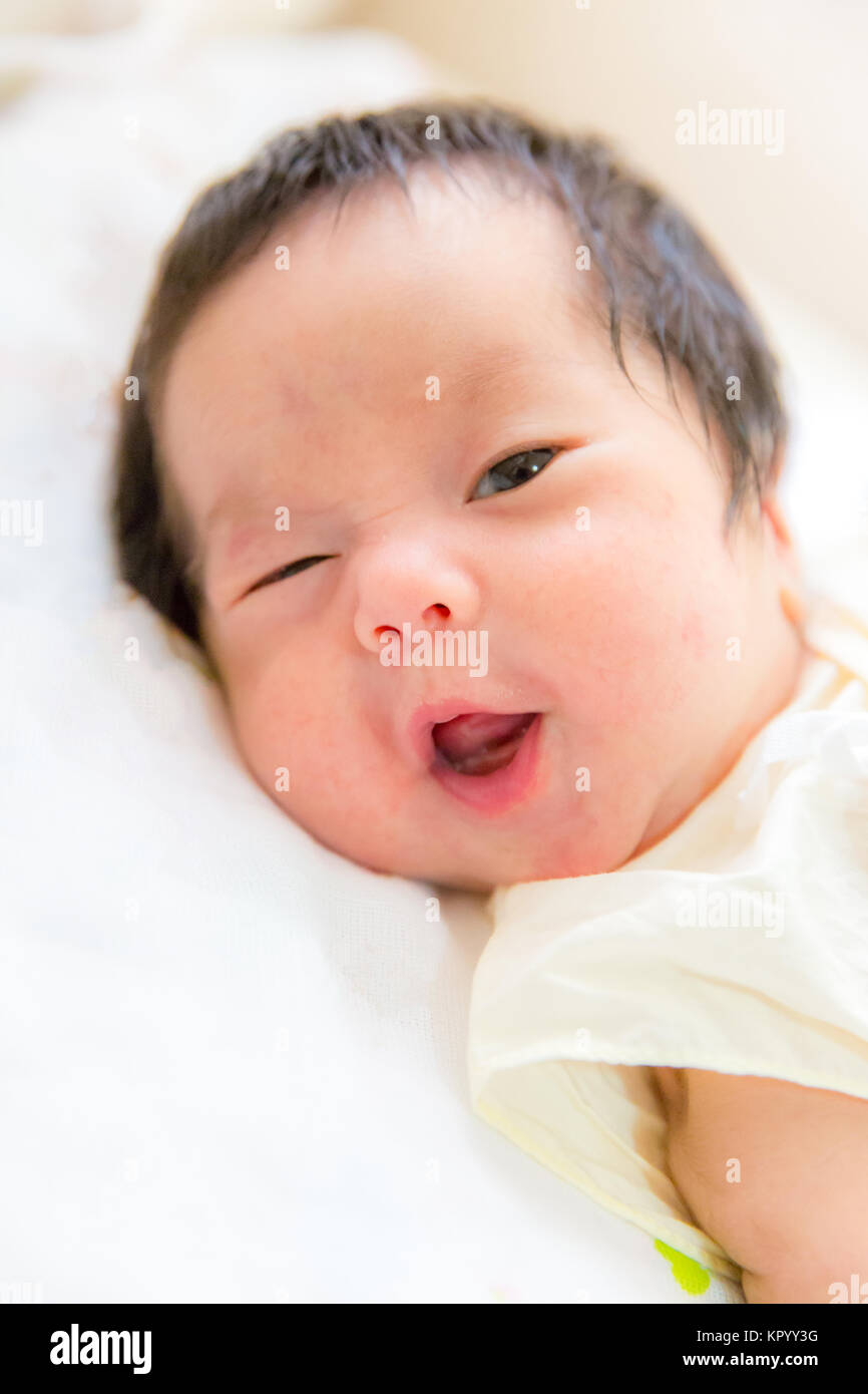 Smile Newborn baby Stock Photo - Alamy
