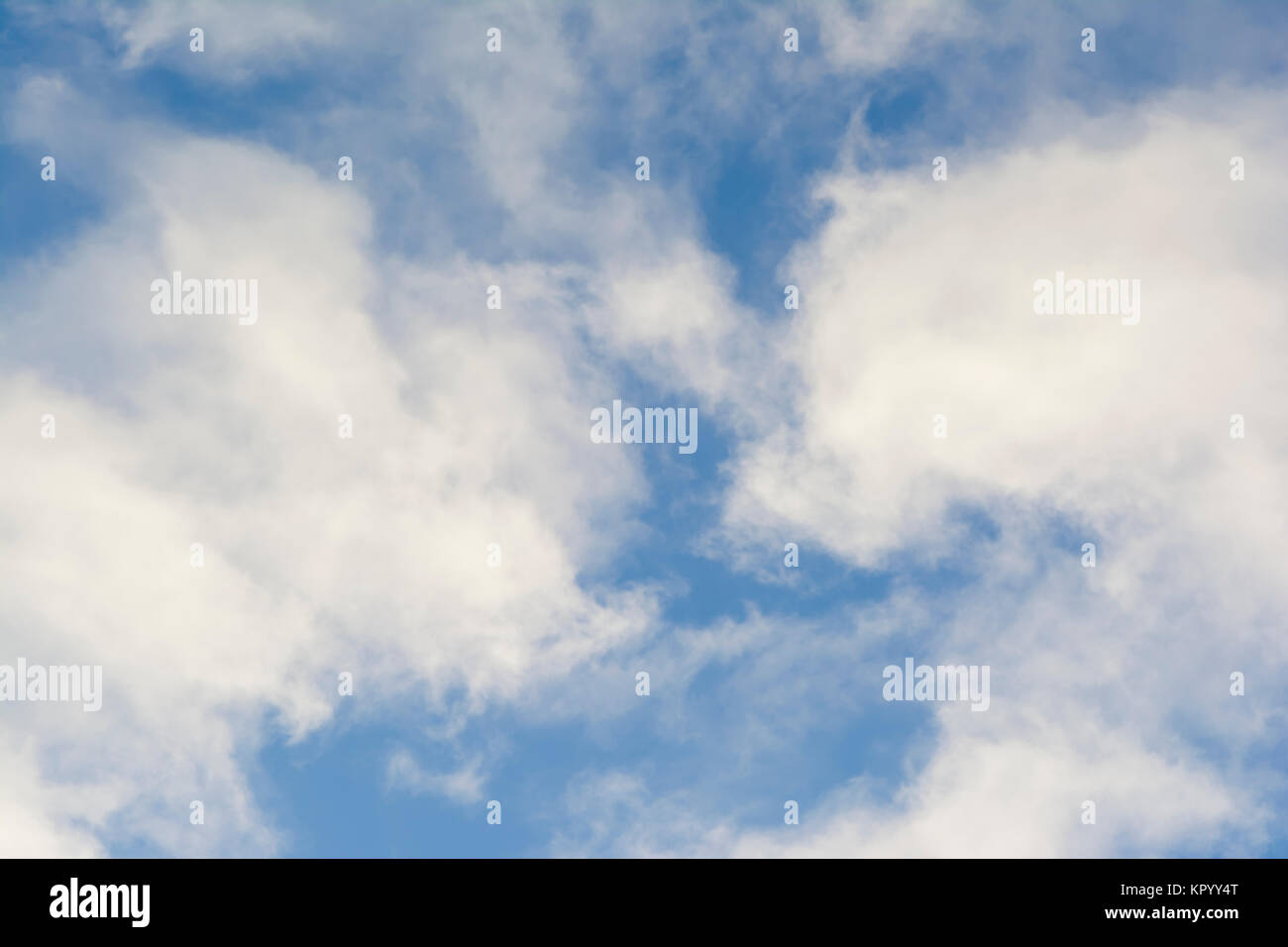 Wispy white clouds against a blue sky. Suitable for abstract forms can ...