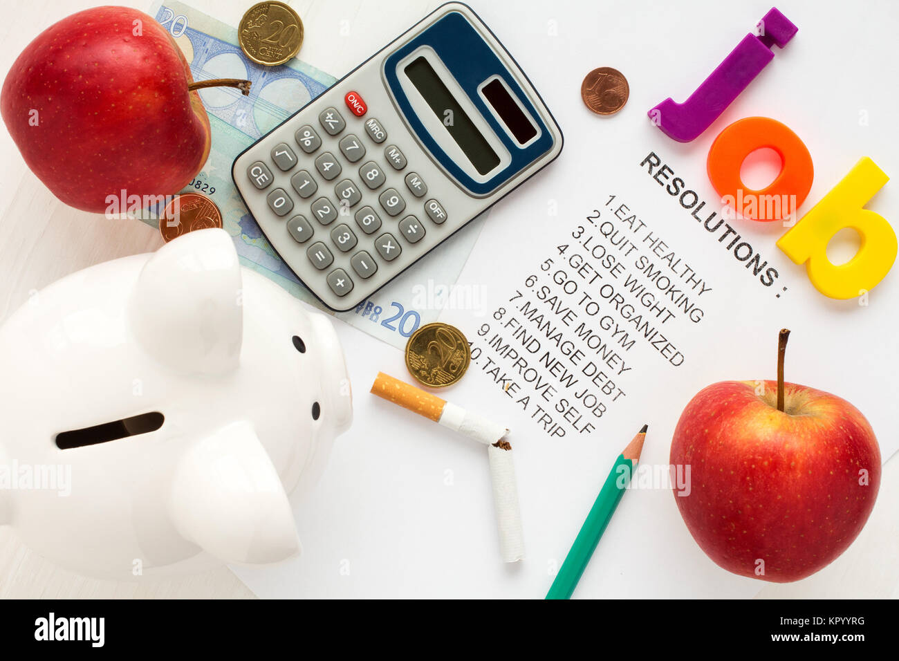 Office supply on list of resolutions Stock Photo - Alamy