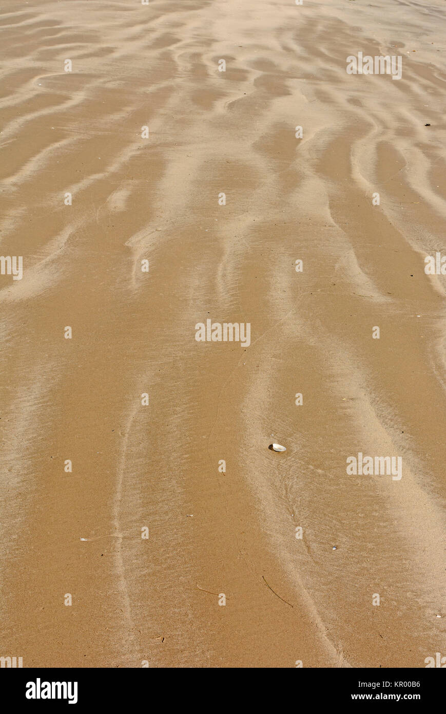 Colorful Patterns on a Sandy Beach Stock Photo - Alamy
