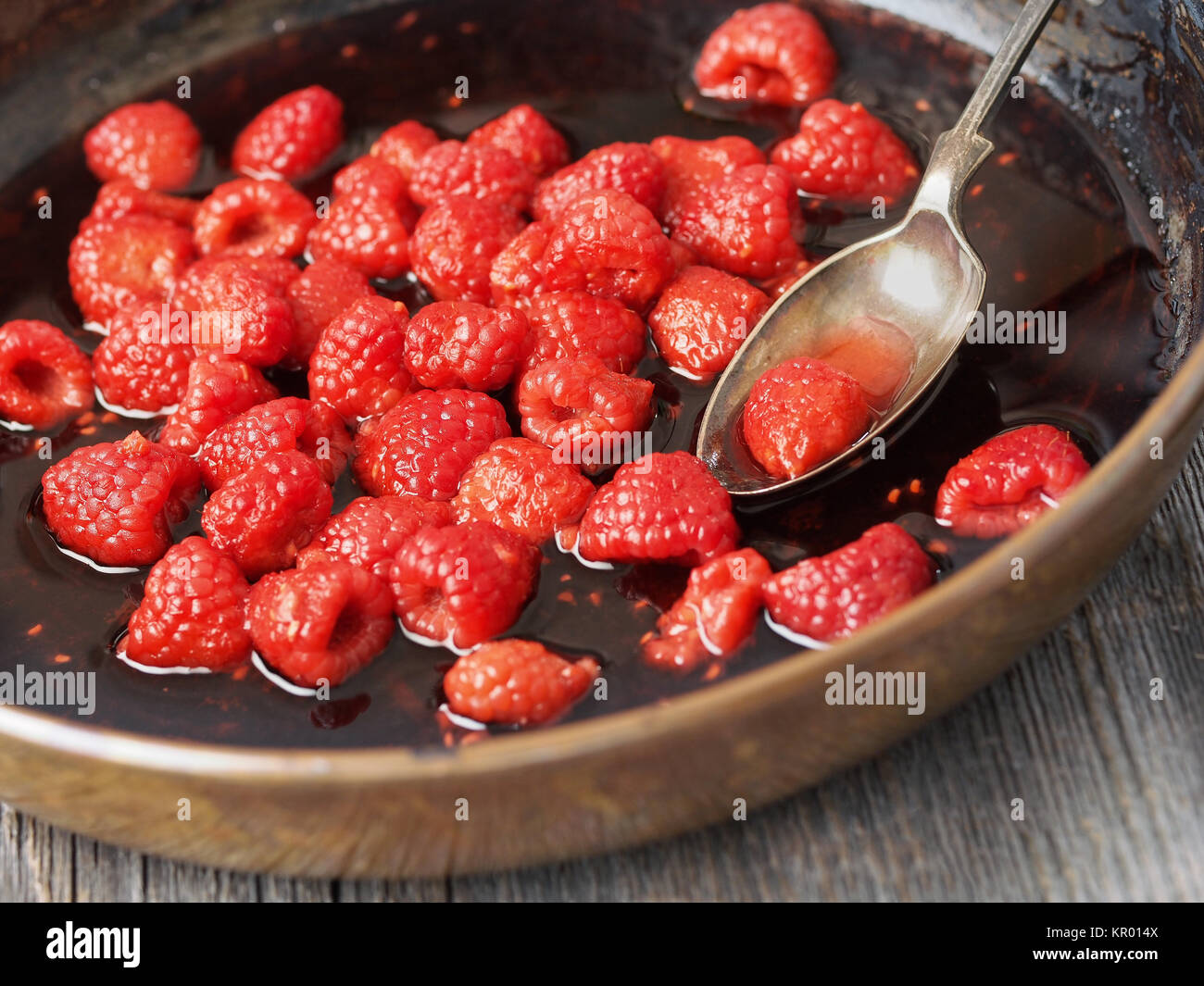 rustic french raspberry fruit compote preserve Stock Photo - Alamy
