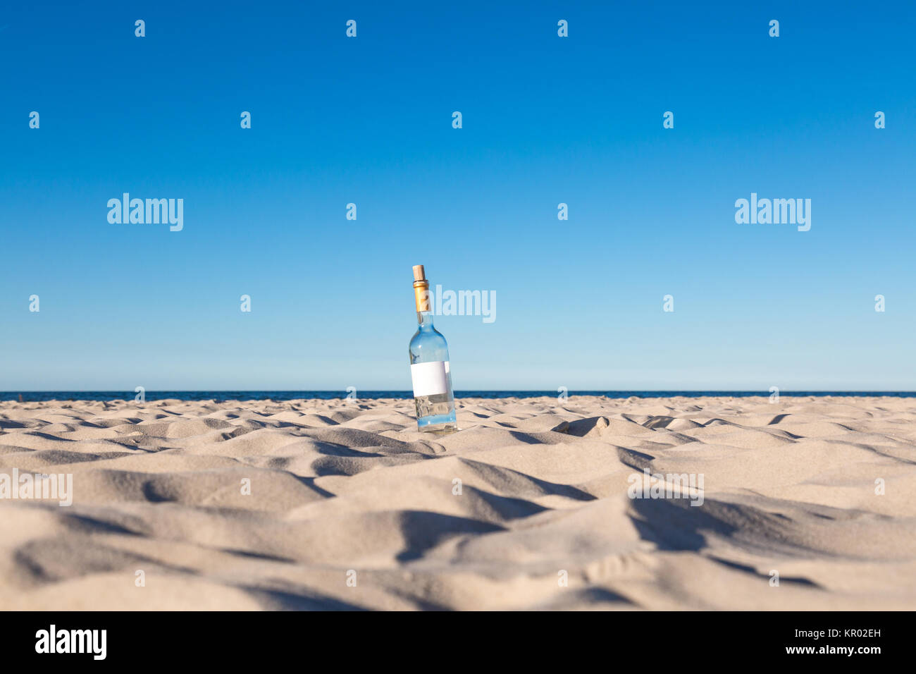 Message in a bottle on the Beach Stock Photo - Alamy