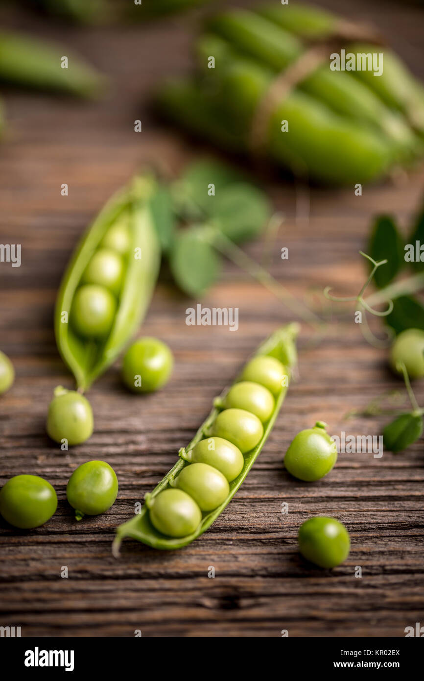 Opened green pea pods Stock Photo - Alamy