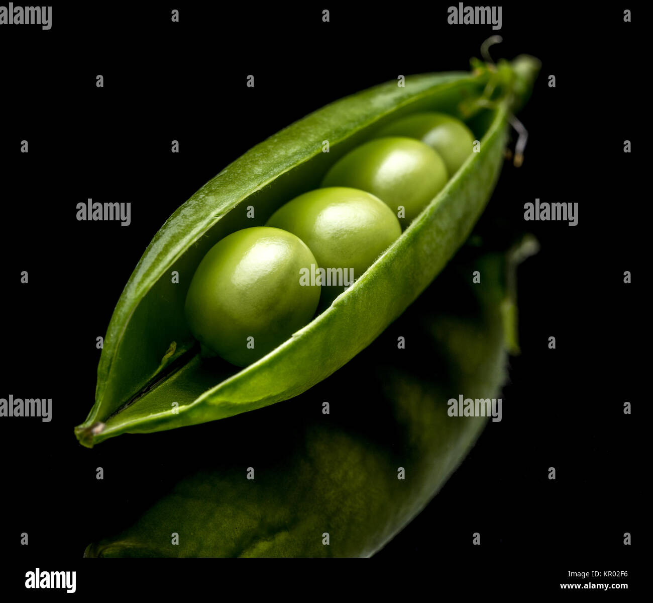 Opened green pea pods Stock Photo - Alamy