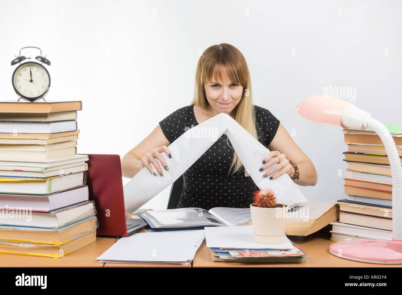 Student with contempt crumples drawing course project Stock Photo - Alamy