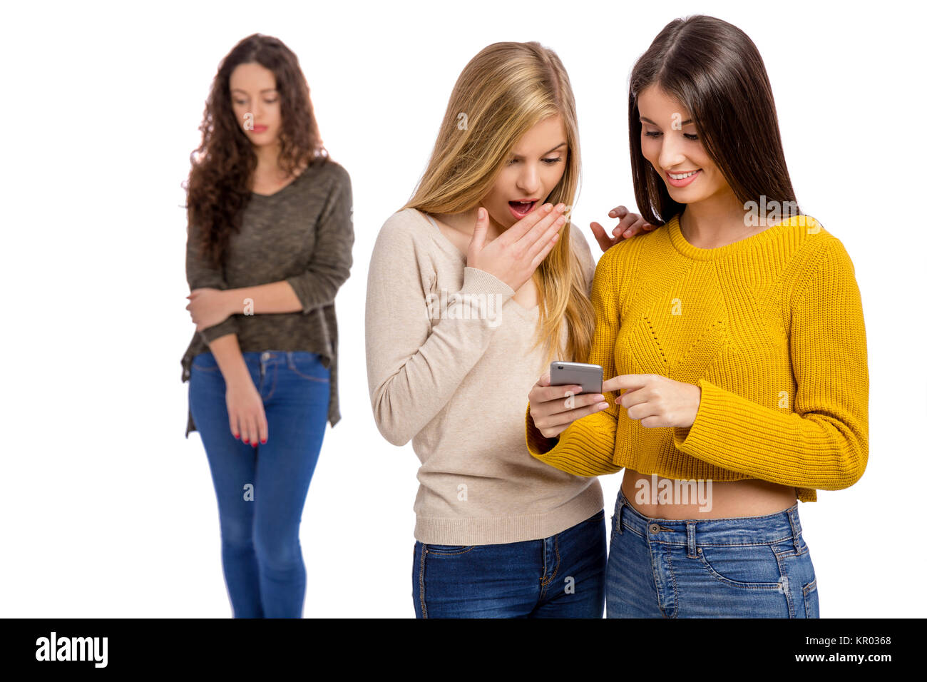 Teenage girls gossiping Stock Photo - Alamy
