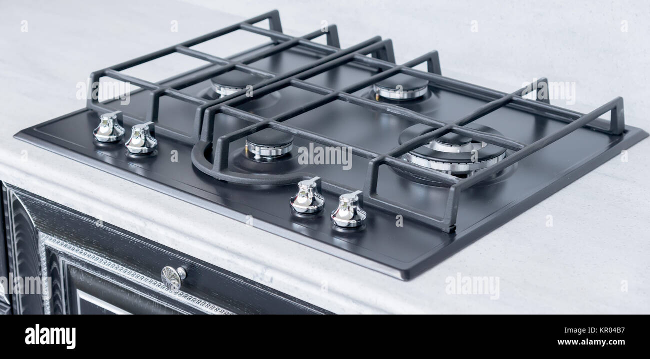 New and modern shining metal gas cooker Stock Photo - Alamy