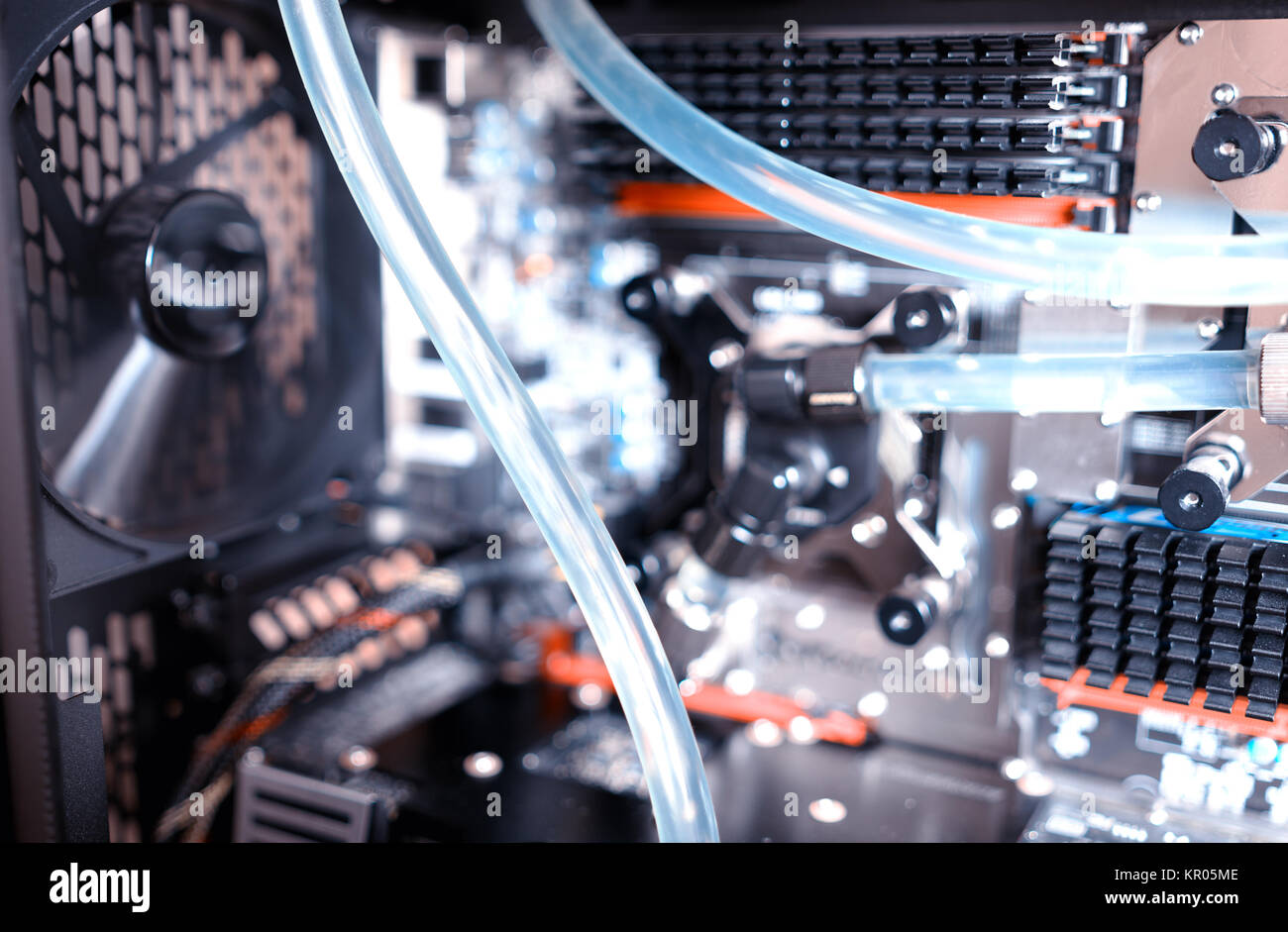 Inside water cooled computer bokeh background Stock Photo - Alamy