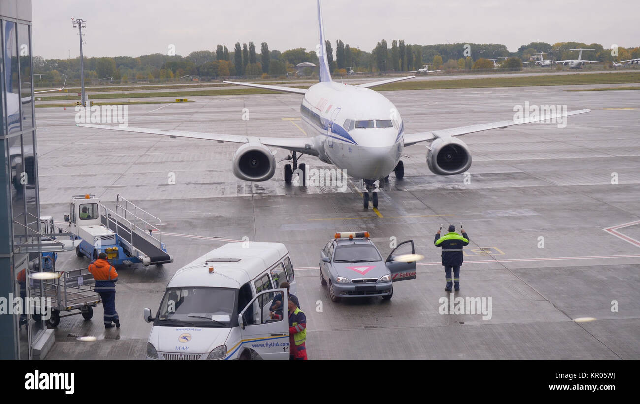 Ground Crew Worker Man Standing and Marshalling Directing an Aircraft ...