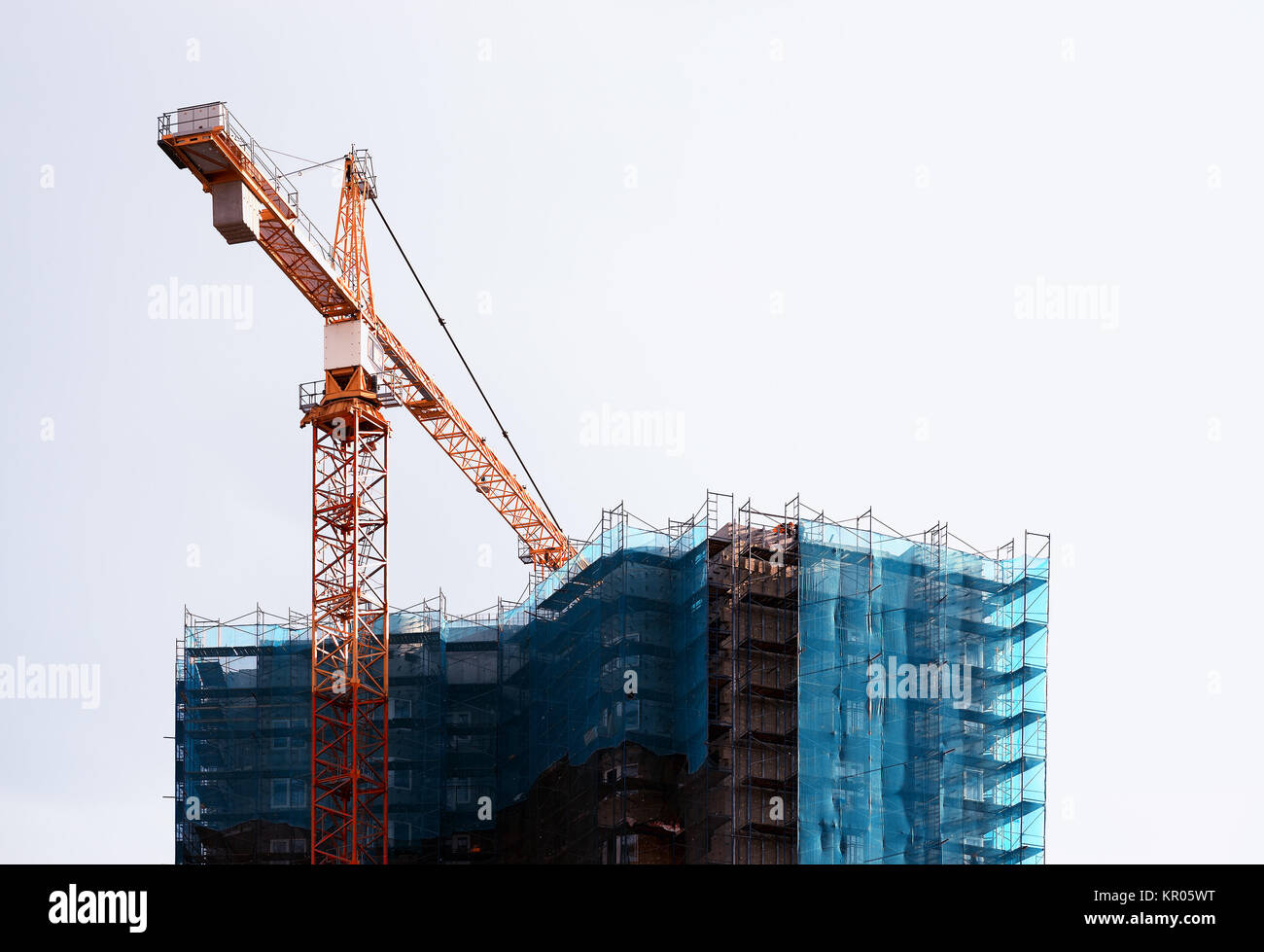 Construction crane building city house background Stock Photo - Alamy