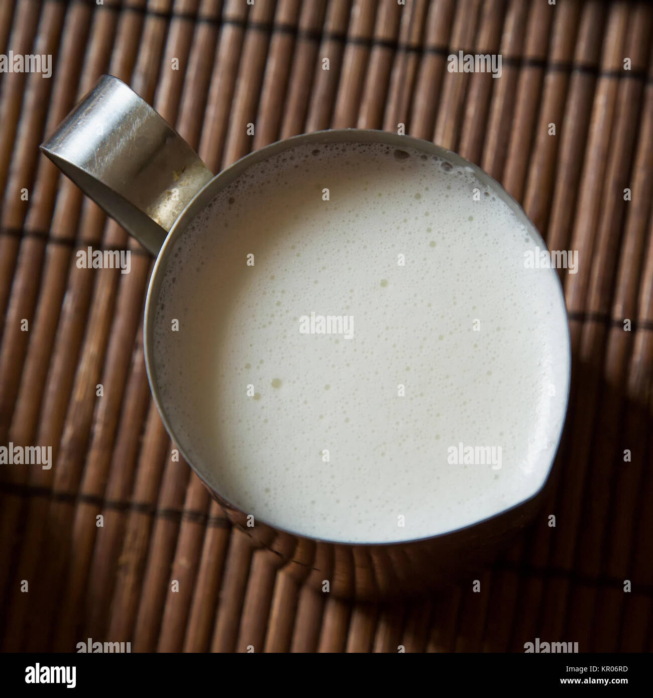 Milk in tin can Stock Photo - Alamy