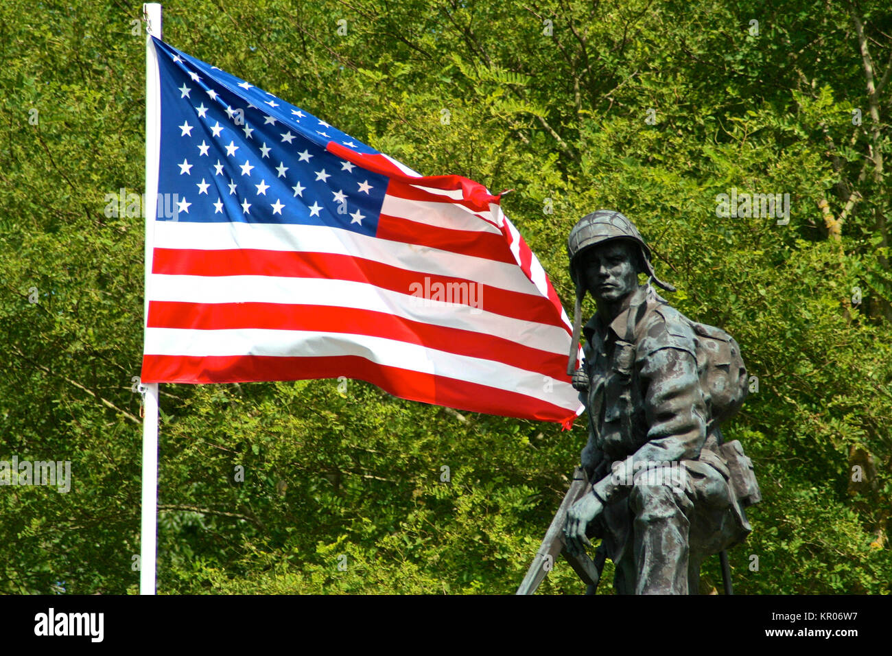 Bronze statue of an Iron Mike, a soldier of the American Army holding a ...