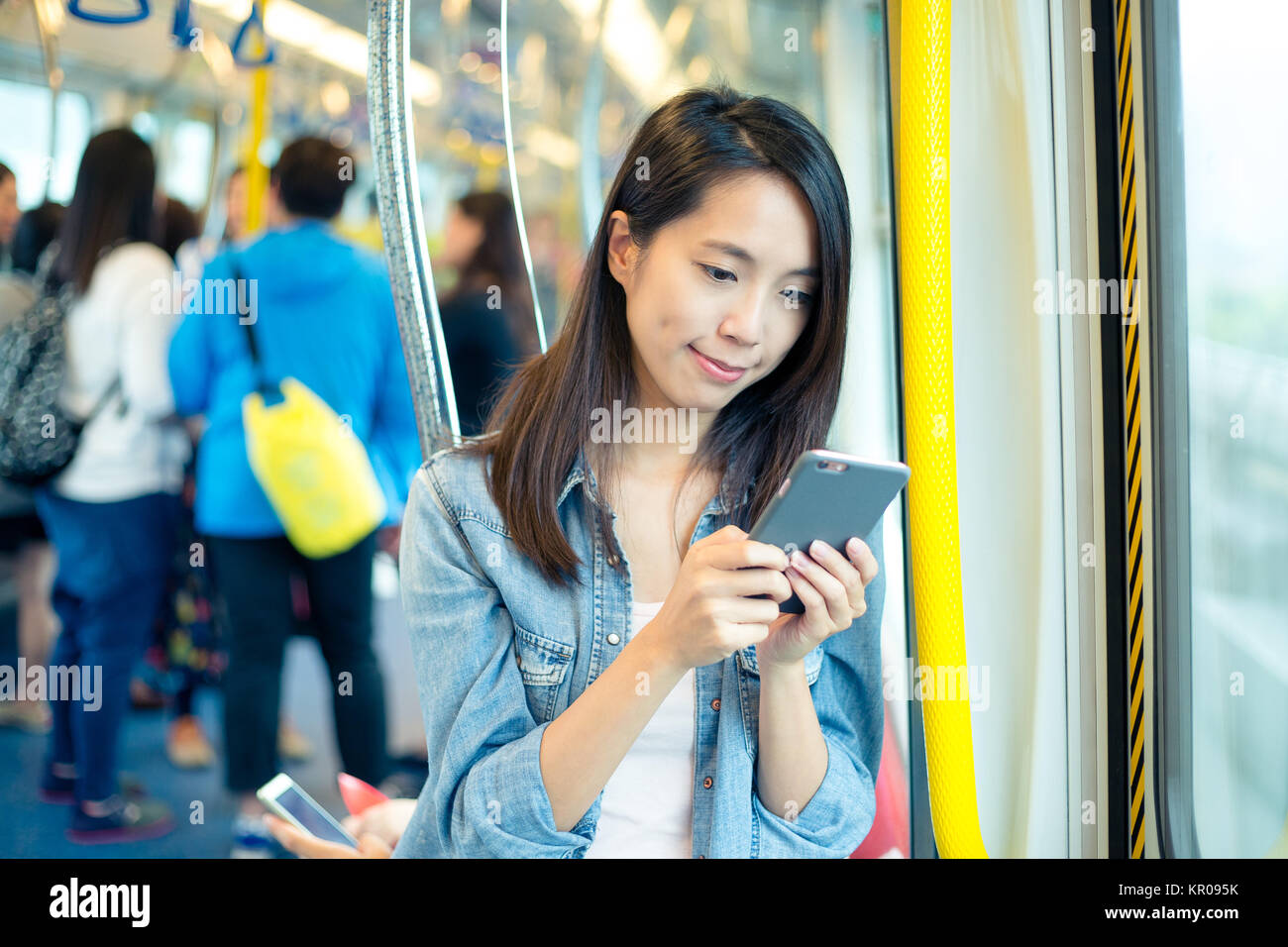 Woman use of mobile phone Stock Photo - Alamy