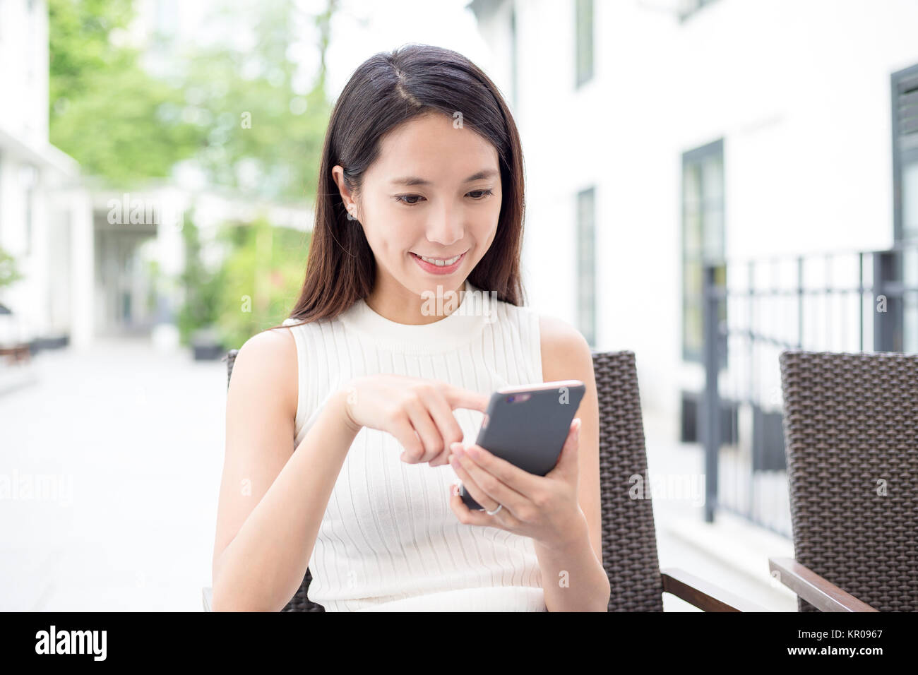 Woman surf the internet on cellphone Stock Photo - Alamy