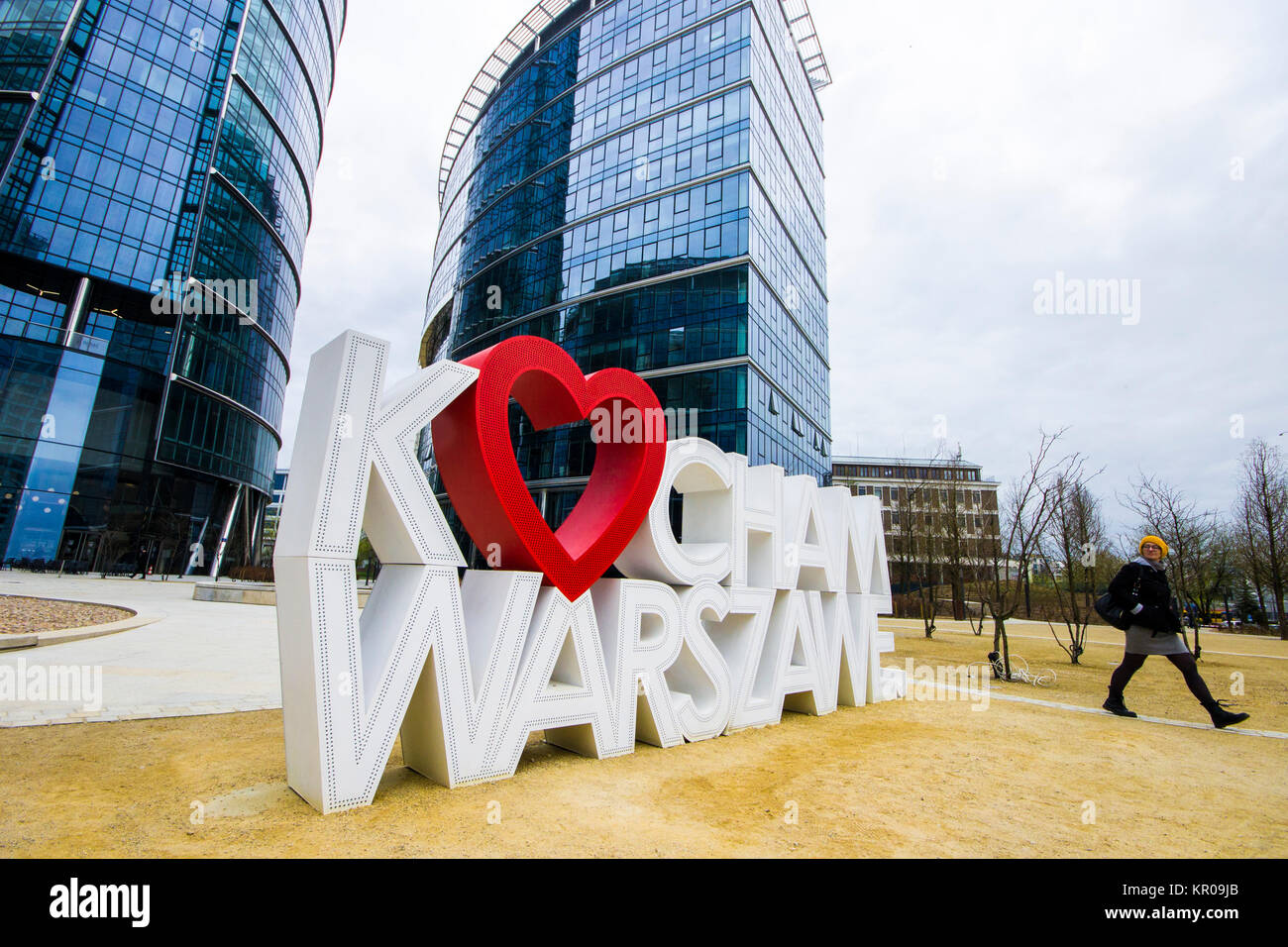 A Kocham Warszawe (I love Warsaw) sign in front of Warsaw Spire, a ...
