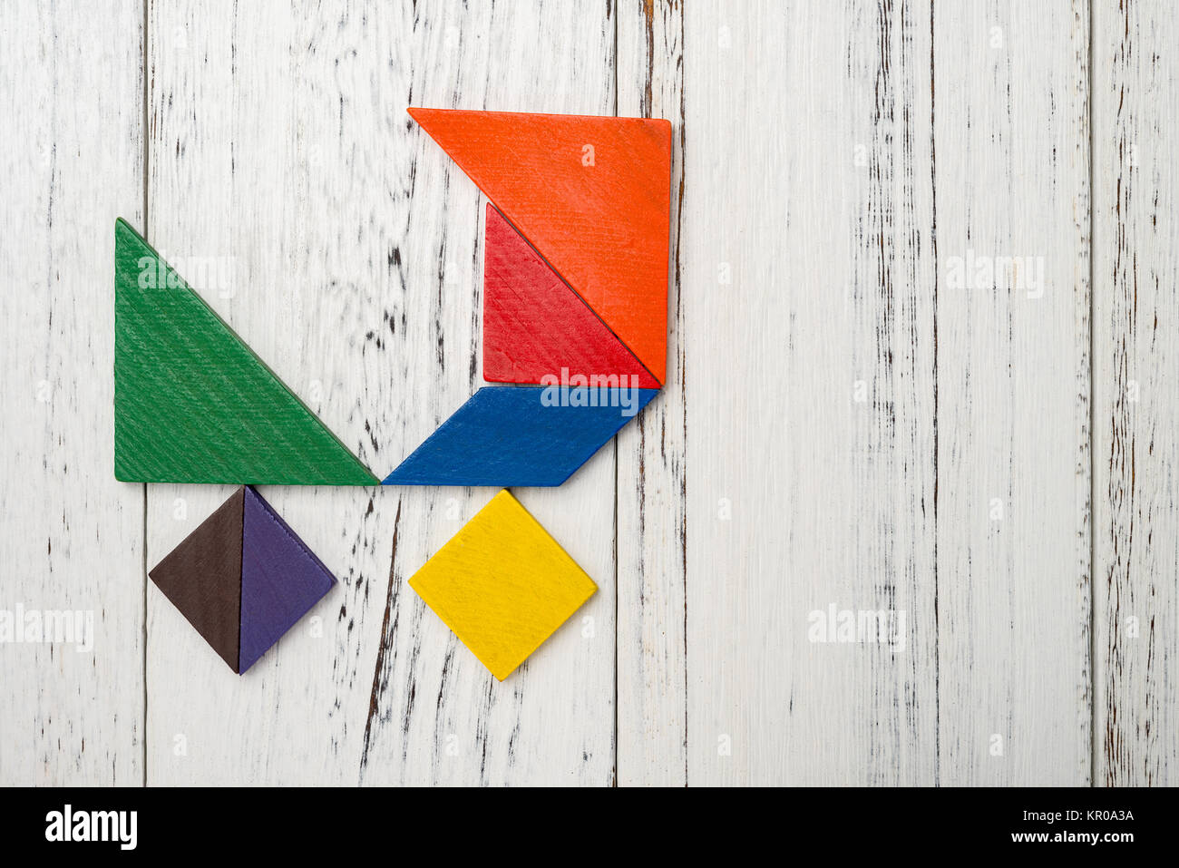 wooden tangram shaped like a baby stroller with copy space Stock Photo ...