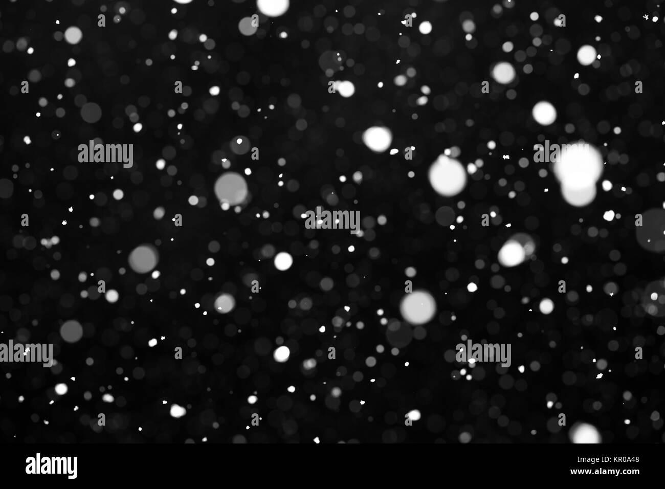 Falling snow on black background. Beautiful winter holiday background ...