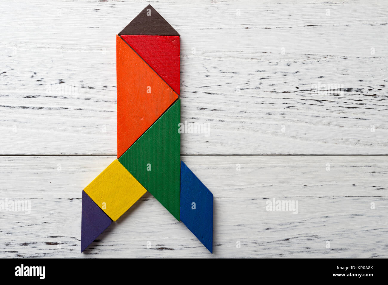 wooden tangram in a rocket shape Stock Photo - Alamy