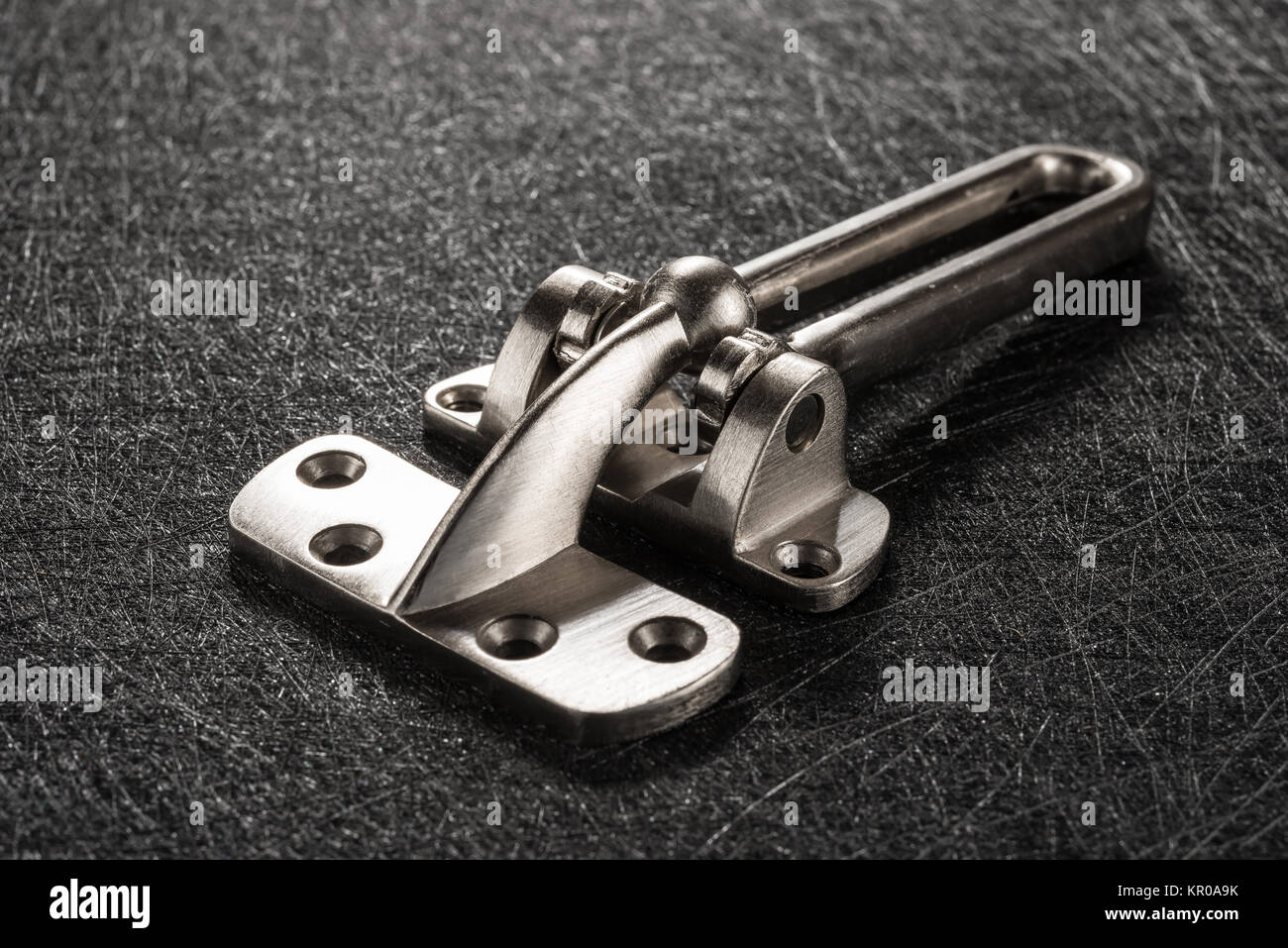 studio shoot of side view stainless steel safety latch opened Stock ...