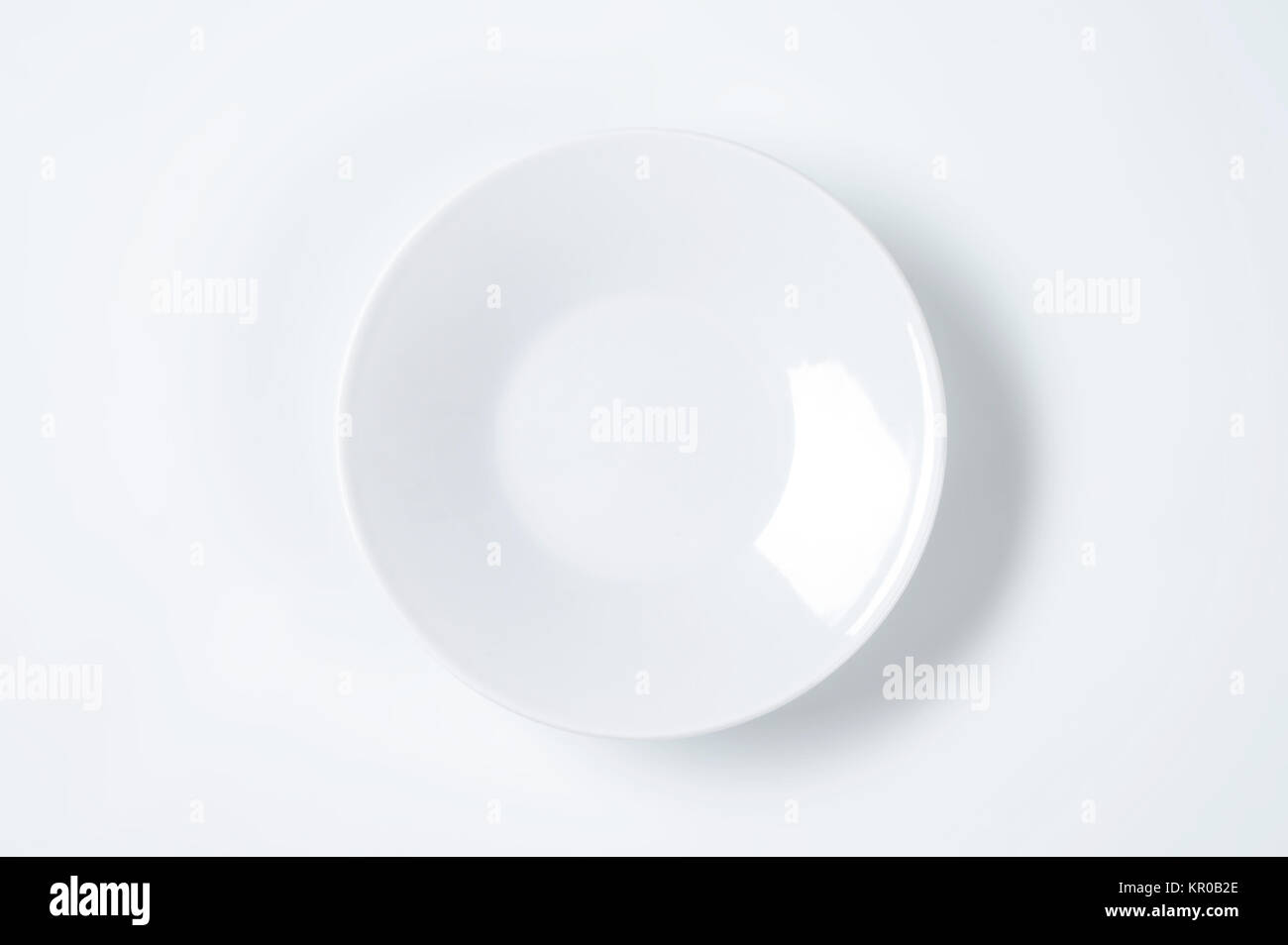 empty small white plate Stock Photo - Alamy