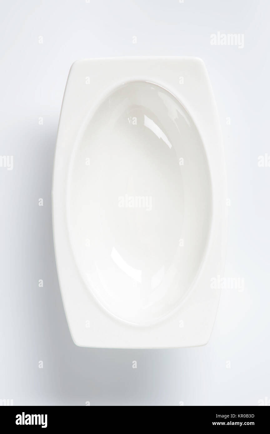 Rectangular rimmed deep oval plate Stock Photo - Alamy