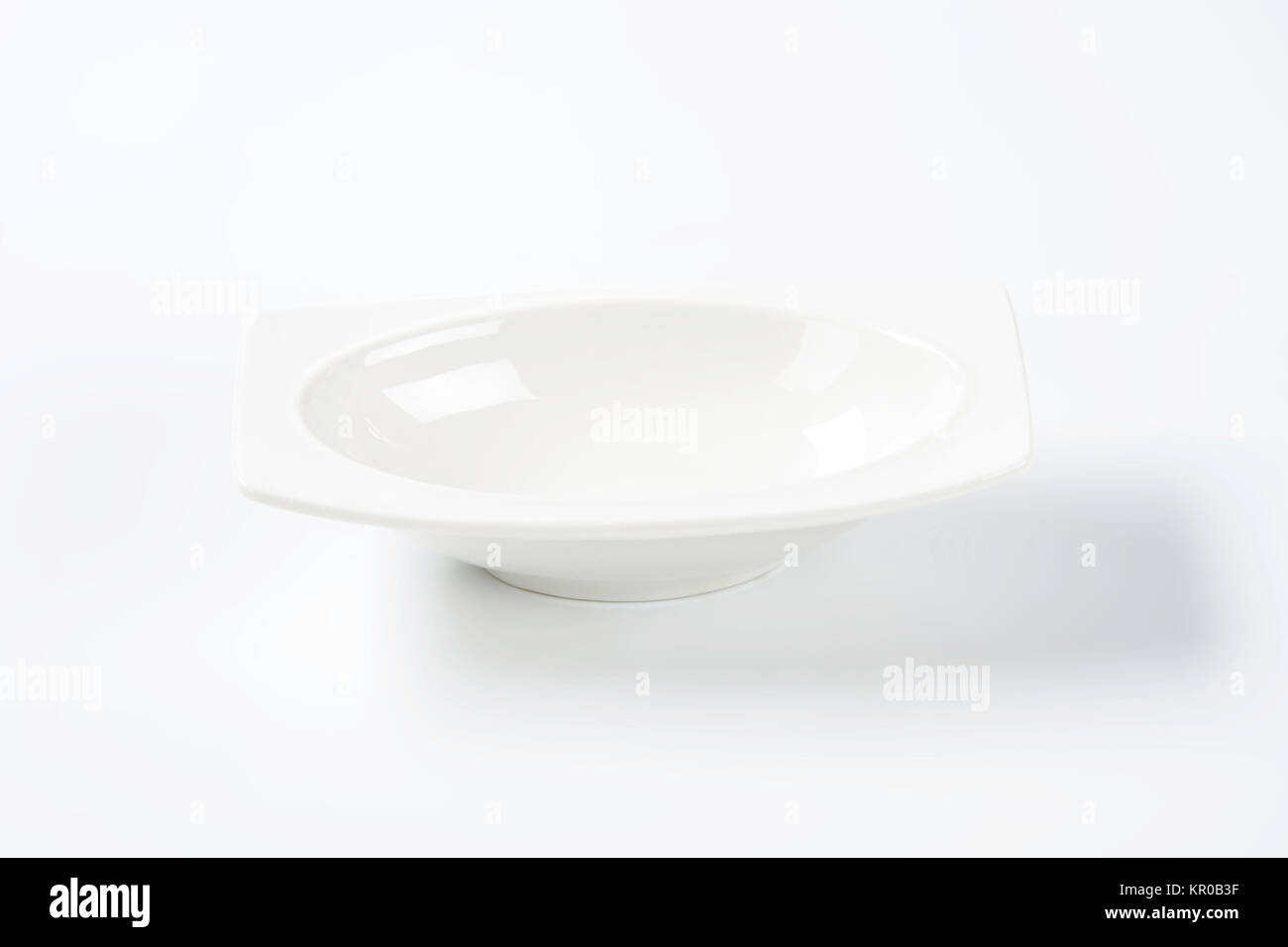 Rectangular rimmed deep oval plate Stock Photo - Alamy