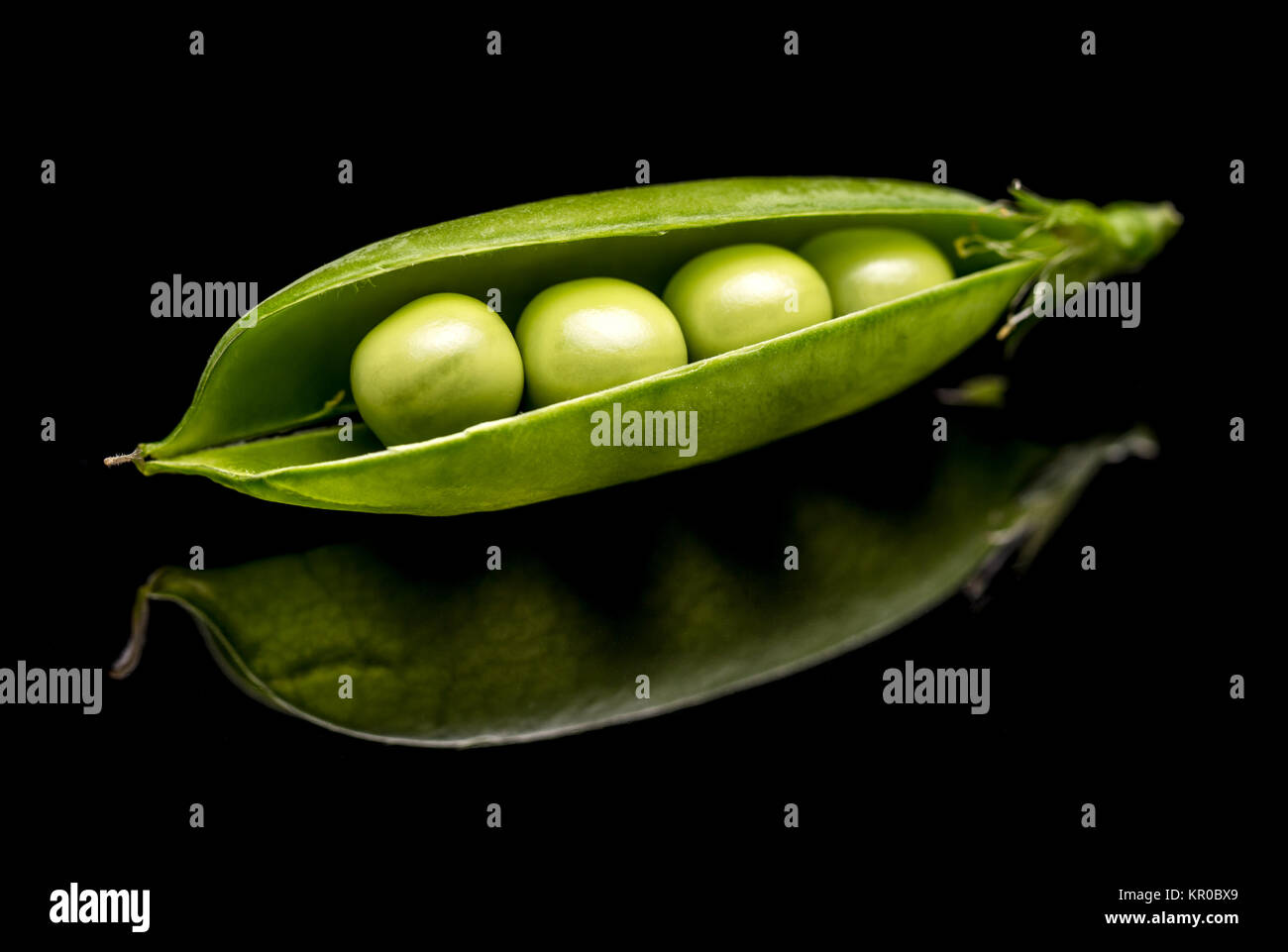 Opened green pea pods Stock Photo - Alamy