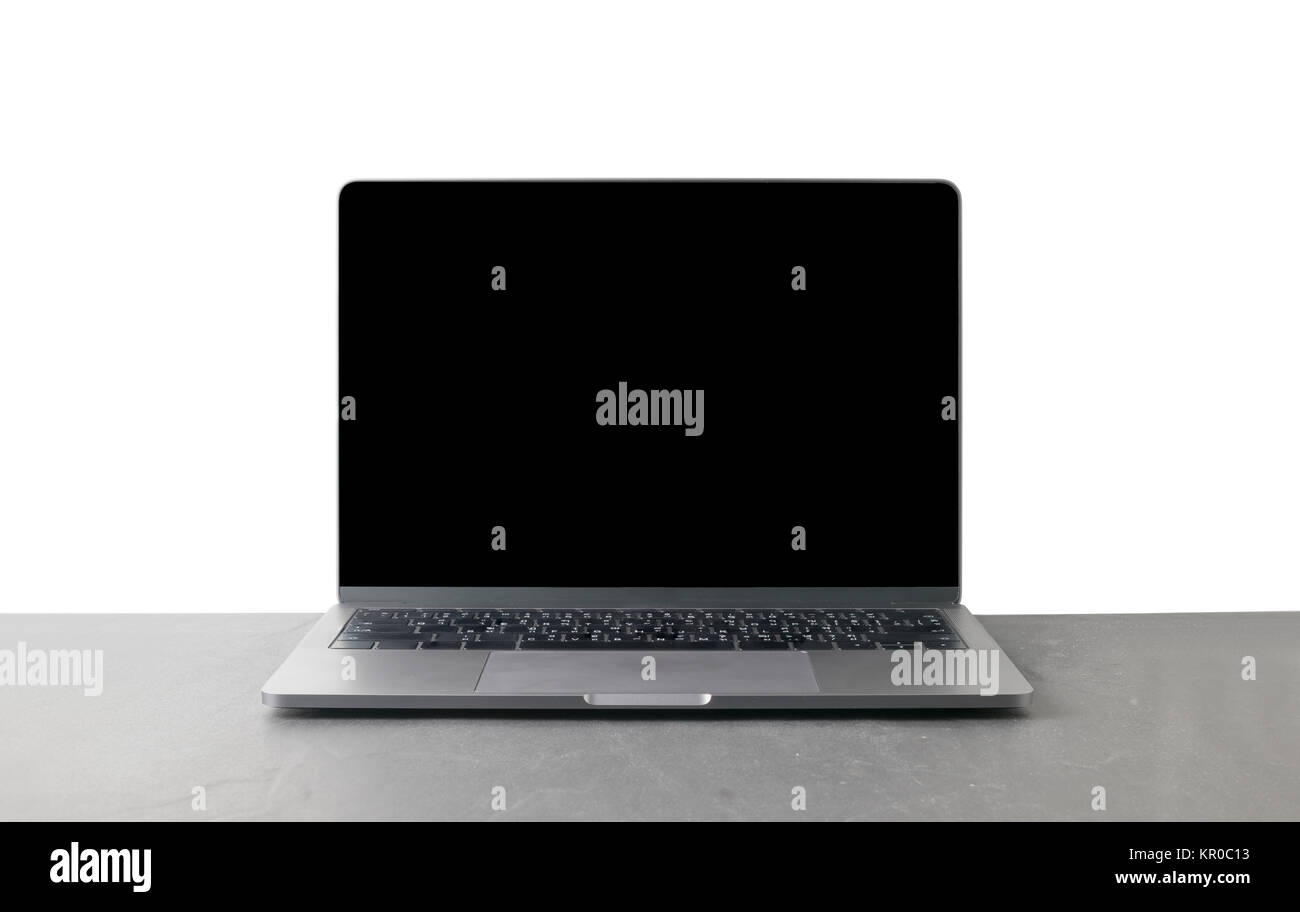 Front view of the laptop is on the work table isolated on white ...