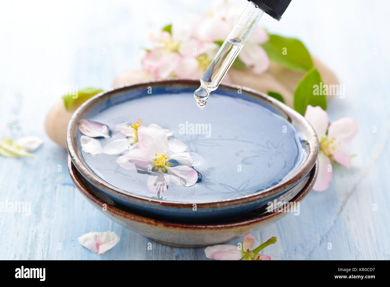 Scented water and flowers Stock Photo - Alamy