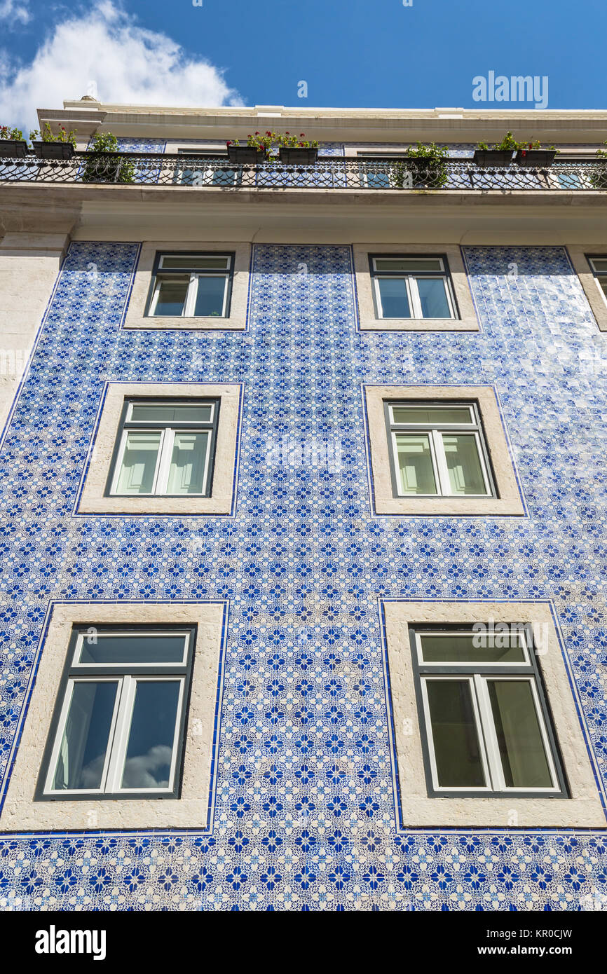 lisbon traditional buildings with typical portuguese tiles on the wall ...