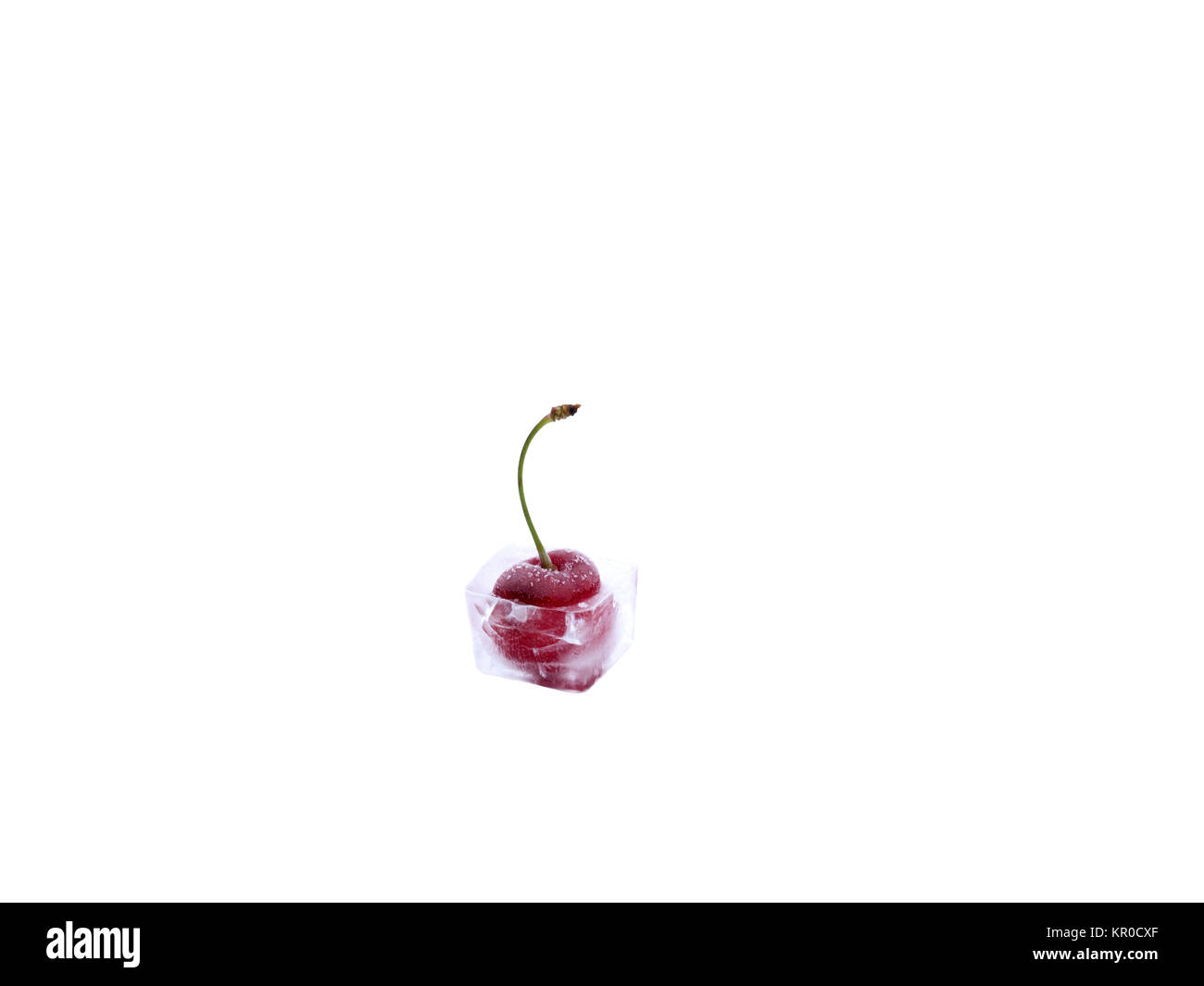 cherry frozen in ice Stock Photo - Alamy