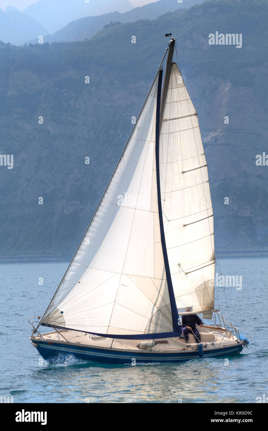Sailboat sailing across blue hi-res stock photography and images - Alamy