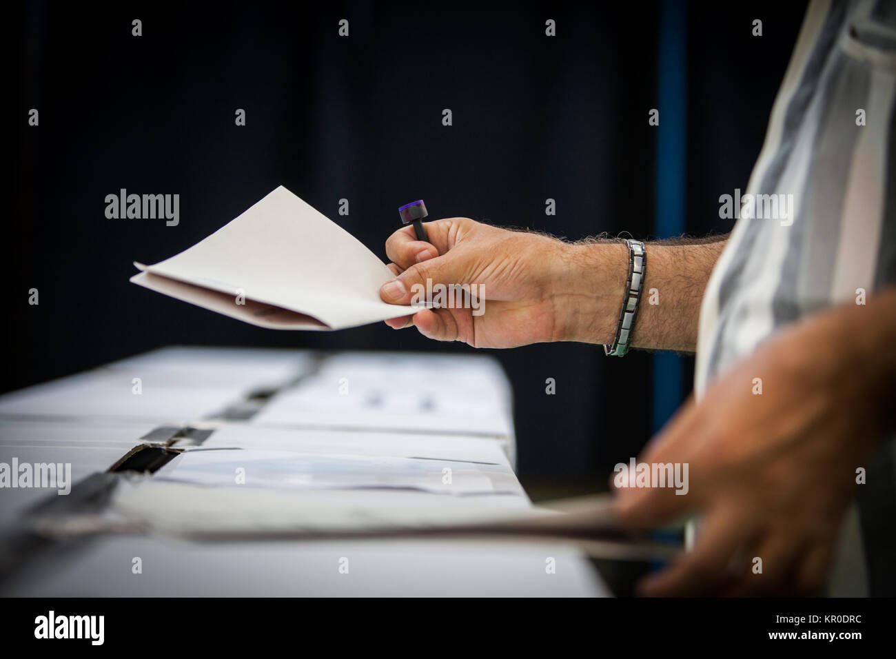 Voting hand detail Stock Photo - Alamy