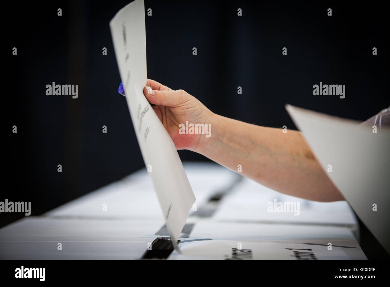 Voting hand detail Stock Photo - Alamy