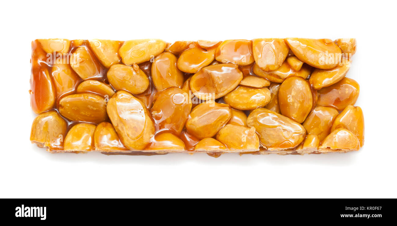 turron bar of caramelised sugar and almonds isolated on white ...