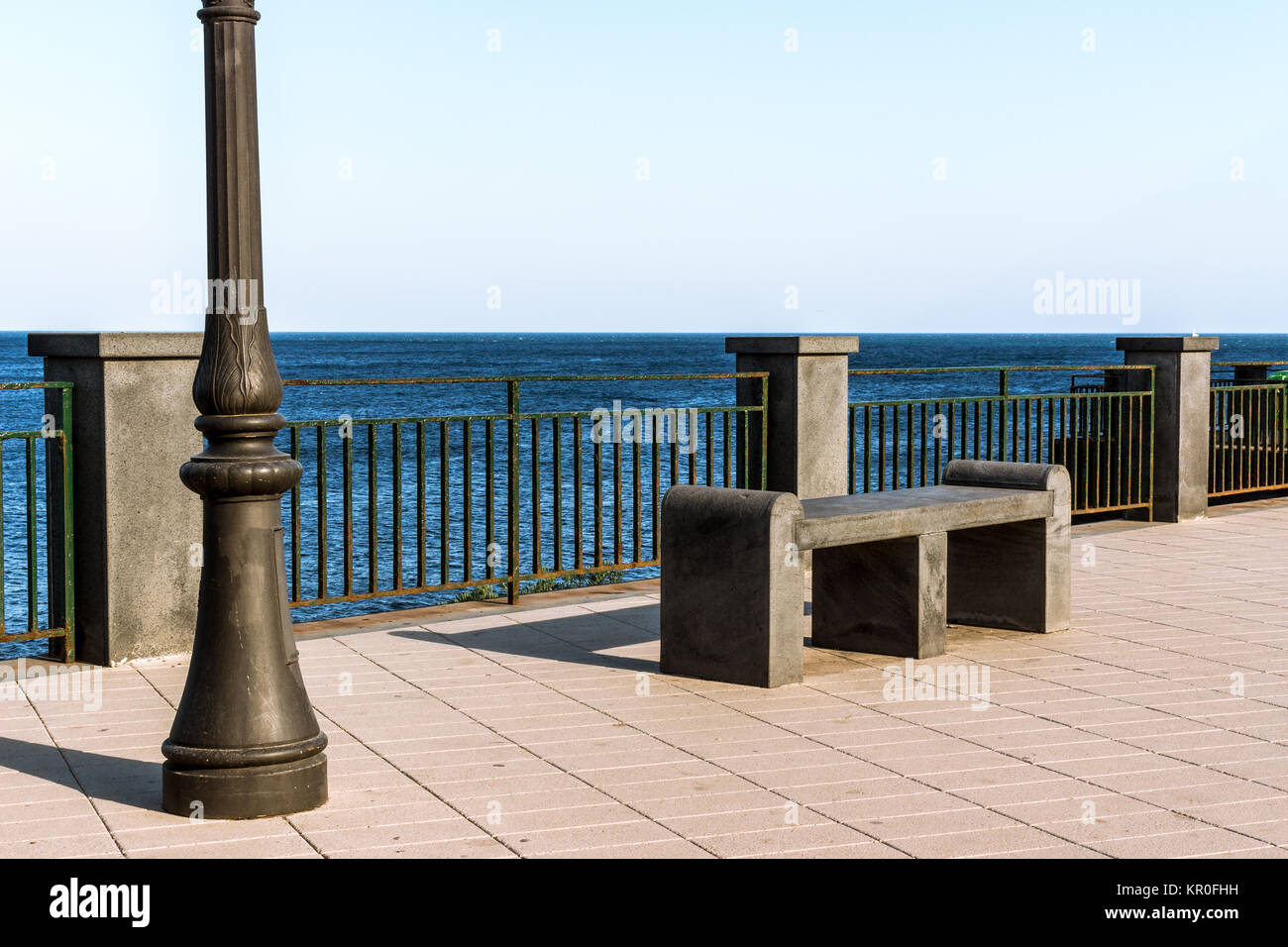 Bench and streetlight Stock Photo - Alamy