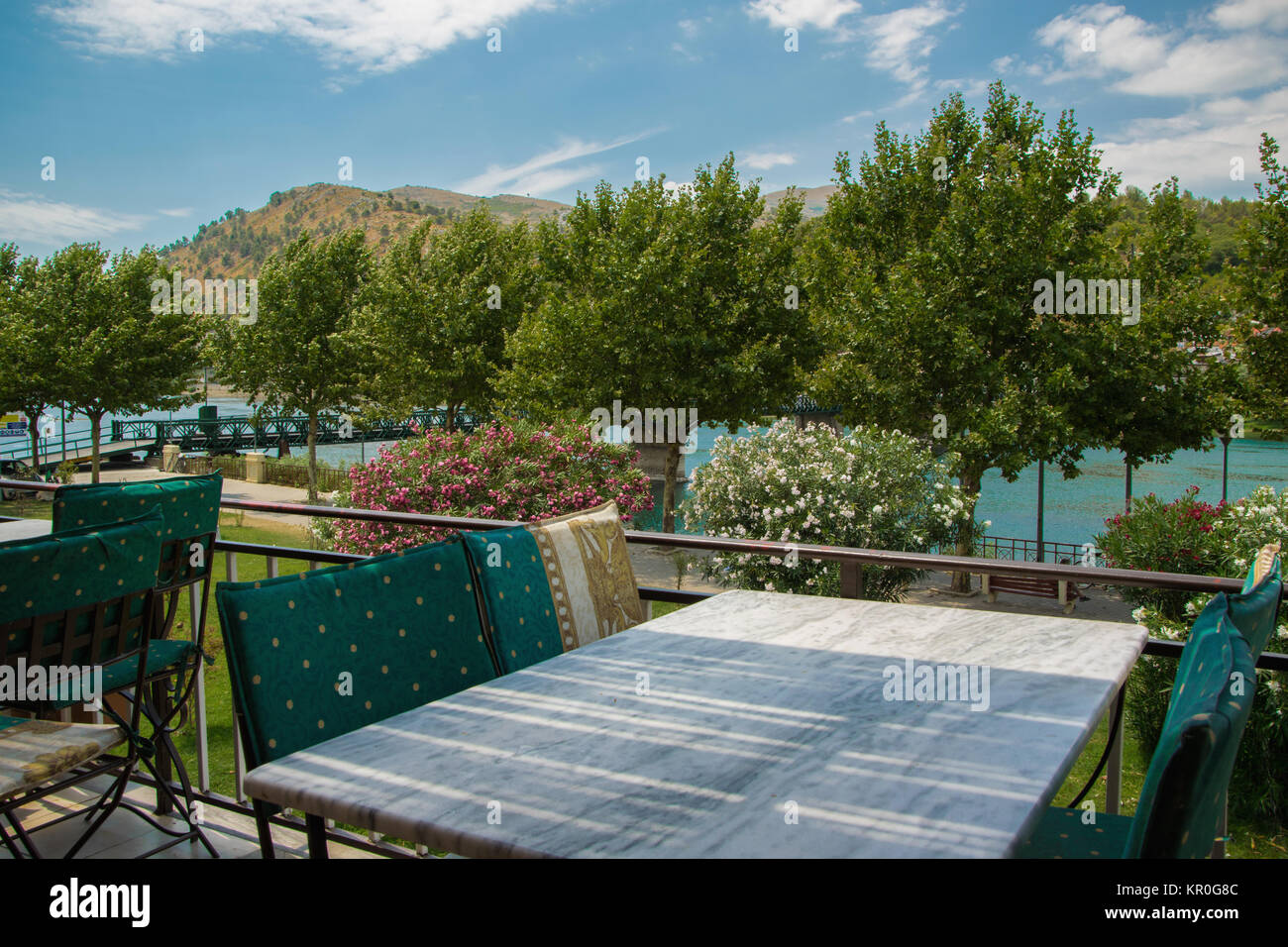 Relaxing location with a view of the flowery park Stock Photo - Alamy