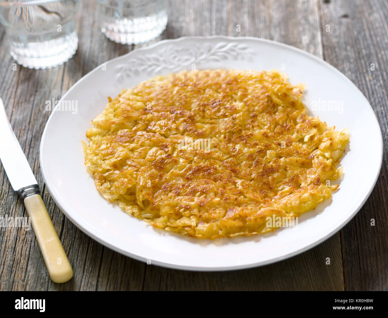 rustic golden crispy swiss rosti Stock Photo - Alamy